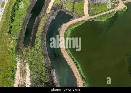 aerial top view of wetland with reclamation ditches for land ...