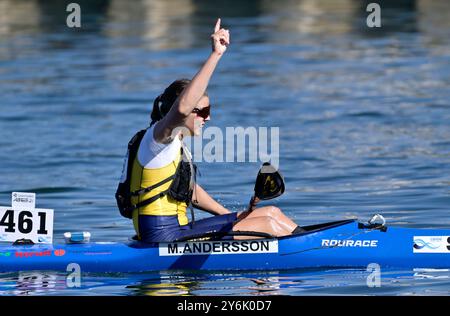 Melina Andersson (SWE) celebrates as she crosses the finish line in the ...