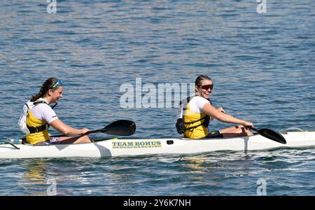 Melina Andersson (SWE) and Ella Richter (SWE) celebrate as they cross ...