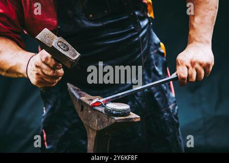 Close-up of a blacksmith's hands working Stock Photo - Alamy