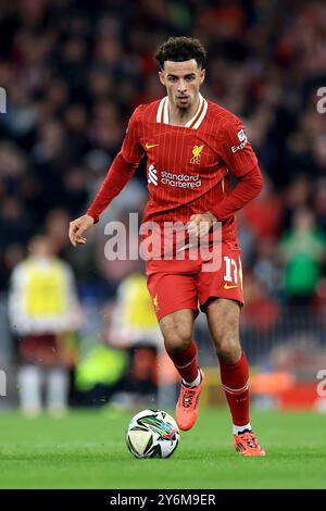 Liverpool's Curtis Jones runs with the ball away from Porto's Fabio ...