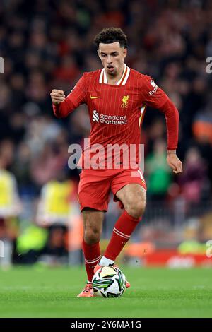 Liverpool's Curtis Jones runs with the ball away from Porto's Fabio ...