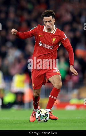 Liverpool's Curtis Jones runs with the ball away from Porto's Fabio ...