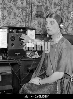 Mr Leslie Henson listens in. 19 March 1923 Stock Photo - Alamy