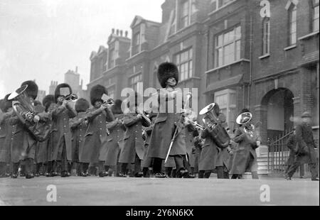 The band of the Grenadier Guards on their way to St James Palace before ...
