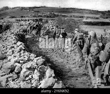 First moves in the recent battle of the Sangro River. A British sentry ...