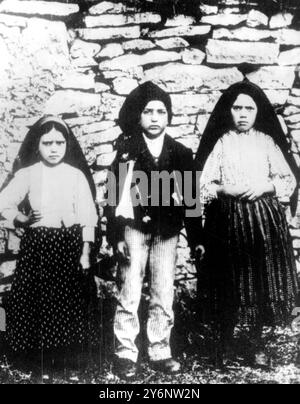 The three children, Jacinta, Francisco and Lucia, who saw the vision of ...