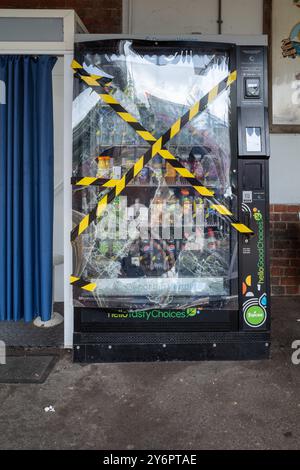 Damaged vending machine. Broken glass. Violence concept. Lausanne ...