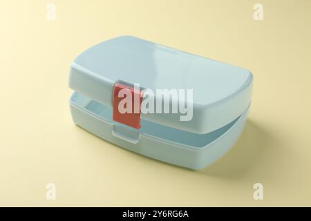 One empty lunch box on light blue background Stock Photo - Alamy