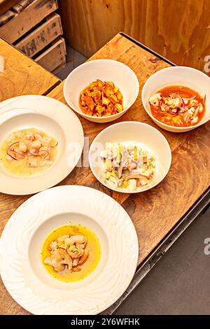 Raw fresh shrimp marinated in fish sauce and garlic served on metal ...