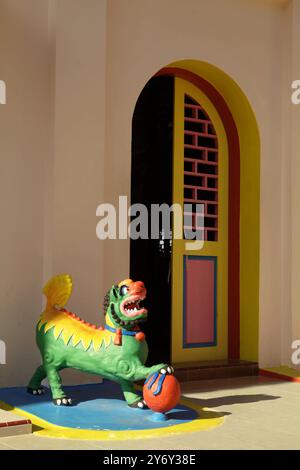 Sculpture of a guardian figure at Pulo Kemaro temple complex—a worship ...