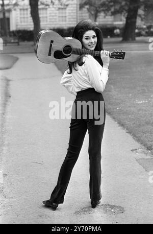 American singing star Bobbie Gentry with guitar in London. She is to ...