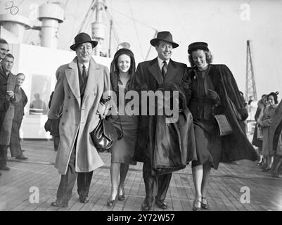 Hollywood film star Ray Milland with his wife Muriel and their two ...