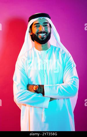 Arab businessman wearing emirati kandura portrait in studio in Dubai ...