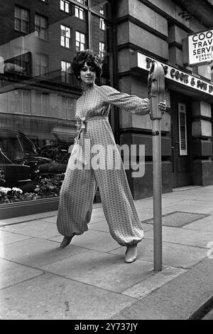 Cilla Johnson , models a carrot colour cat suit in printed jacquard ...