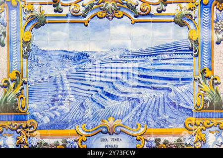 Blue azulejos with motifs from Douro Valley, train station of Pinhao ...