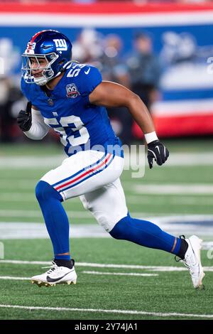 New York Giants' Darius Muasau (53) is assisted off the field after ...