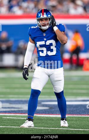 New York Giants linebacker Darius Muasau (53) tackles Atlanta Falcons ...