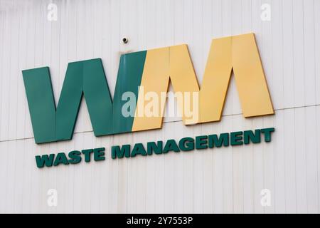 WM Waste Management collection center with trash collection truck. WM ...