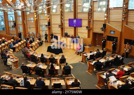 King Charles III addressing the Holyrood Chamber during a visit to the ...
