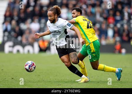 Derby County's Marcus Harness (left) scores their side's second goal of ...