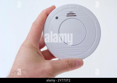 Smoke detectors in one hand Stock Photo - Alamy