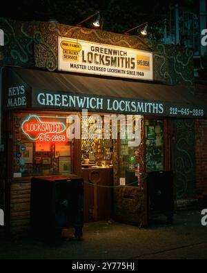 Greenwich Locksmiths storefront at night in the West Village, Manhattan ...