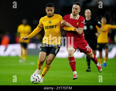 Wolverhampton Wanderers' Joao Gomes (left) and Brighton and Hove Albion ...