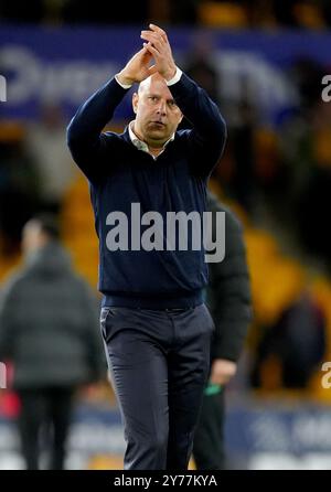 Arne Slot manager of Liverpool applauds the fans after the game during ...