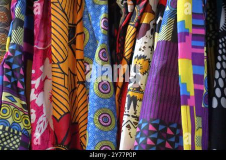Colored tribal african shirts on rack Stock Photo - Alamy
