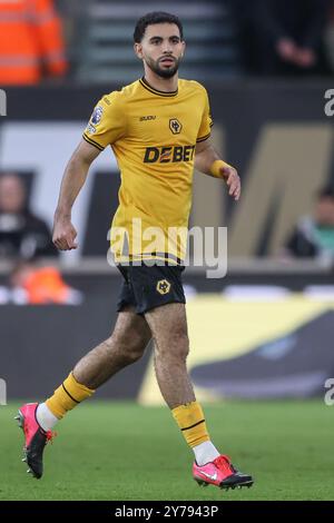 Rayan Aït-Nouri of Wolverhampton Wanderers jumps up to win the high ...