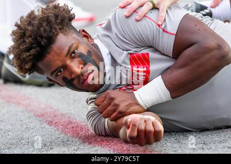 Ohio State defensive back Caleb Downs, right, celebrates after his ...