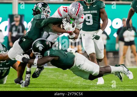 Ohio State wide receiver Carnell Tate (17) and Illinois defensive back ...