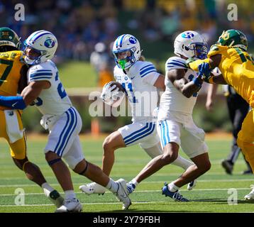 BYU wide receiver Parker Kingston (11) evades the tackle of West ...