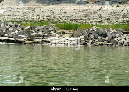 concrete cubes that serve as coastal protection against river erosion ...