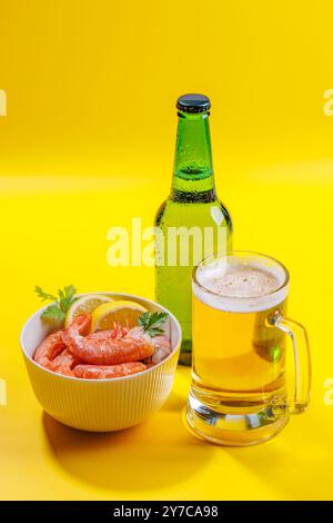 A vibrant photo showcasing a glass of beer surrounded by various snacks ...