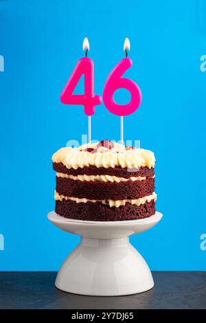 Candle number 46 - Cake birthday in coral fusion background Stock Photo ...