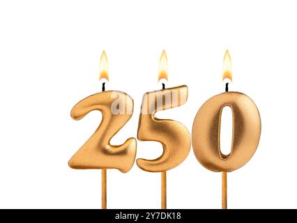Golden number 250 birthday candle on white background Stock Photo - Alamy