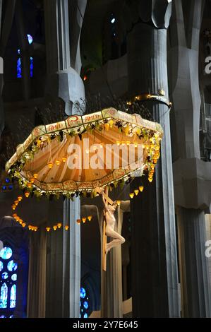 Jesus sculpture hanging in the Sagrada Familia basilica - a famous cathedral designed by Catalan ...