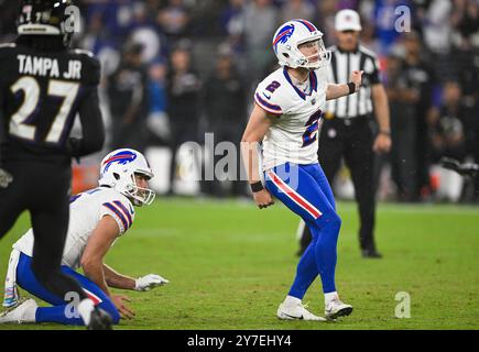 Baltimore Ravens place kicker Tyler Loop kicks a field goal as punter ...