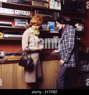 Buying hi-fi equipment in the 1970s Stock Photo - Alamy