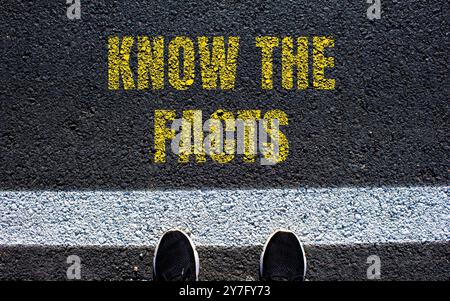 Know the facts message written on wooden block with pink background ...