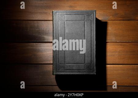 Closed Bible on a Wooden Table Stock Photo - Alamy
