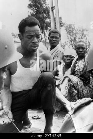 PRISONER WITH OFFICER IN BUKAVU, CONGO BACK OF A TRUCK ; 28 AUGUST 1964 ...