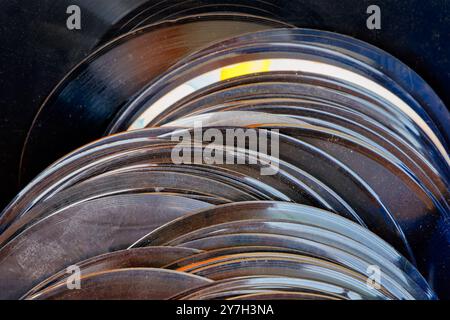 Stack of old single vinyl records, one upright in front with copy space ...