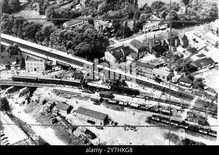 This aerial image of Cheadle Hulme Station showcases the railway ...