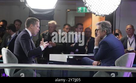 Leadership contender Robert Jenrick (left) during an interview with ...