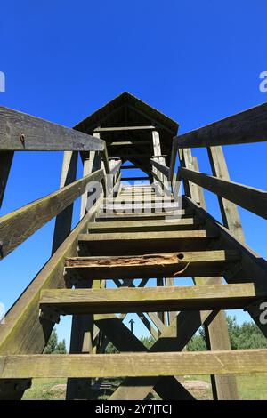 View through a wooden staircase from bottom to top Stock Photo - Alamy