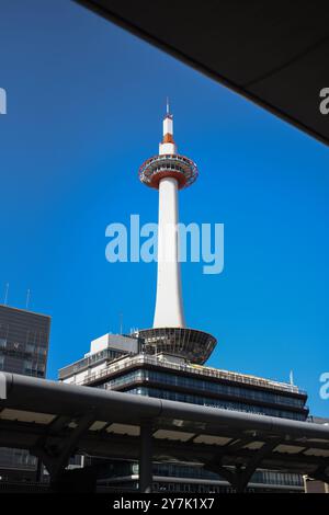 Kyoto Tower, an iconic landmark of Kyoto, Japan. This photograph shows ...