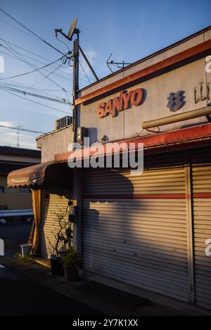 Sanyo sign on building, Kyoto, Japan Stock Photo - Alamy
